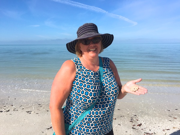 Pat Goodwin with sand dollar | I Love Shelling